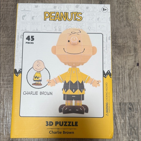 Peanuts | Games | Peanuts Charlie Brown 3d Puzzle Yellow And Black ...